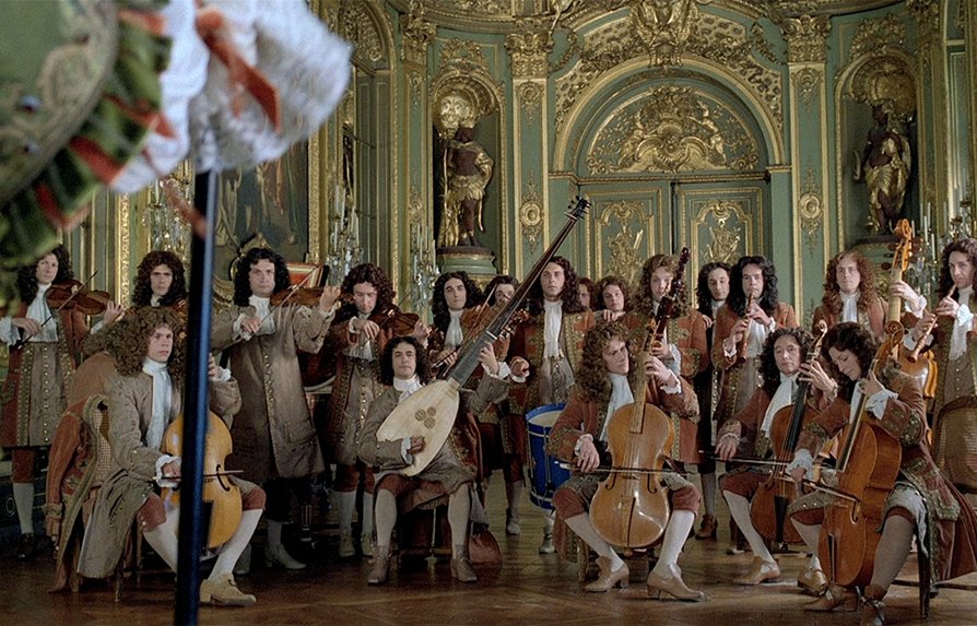 This image shows an orchestra playing in what appears to be a very nice ...