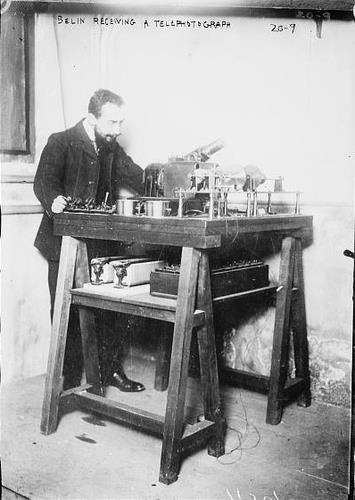Arthue Korn with his phototelegraphy invention.
