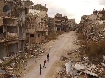 Drone footage reveals devastation of Homs in Syria as Europe’s stance ...