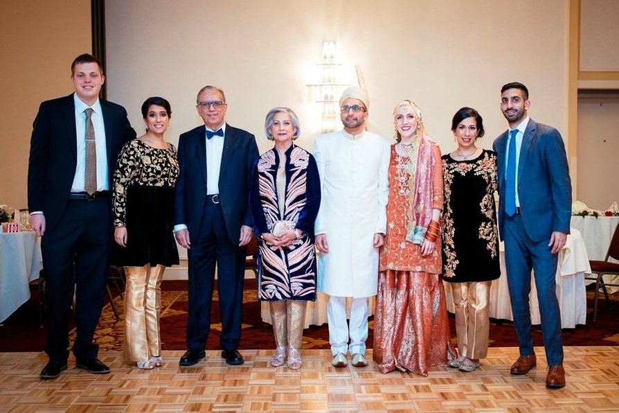 Shahjehan's family stands together. Shahjehan and his wife Lauren are ...