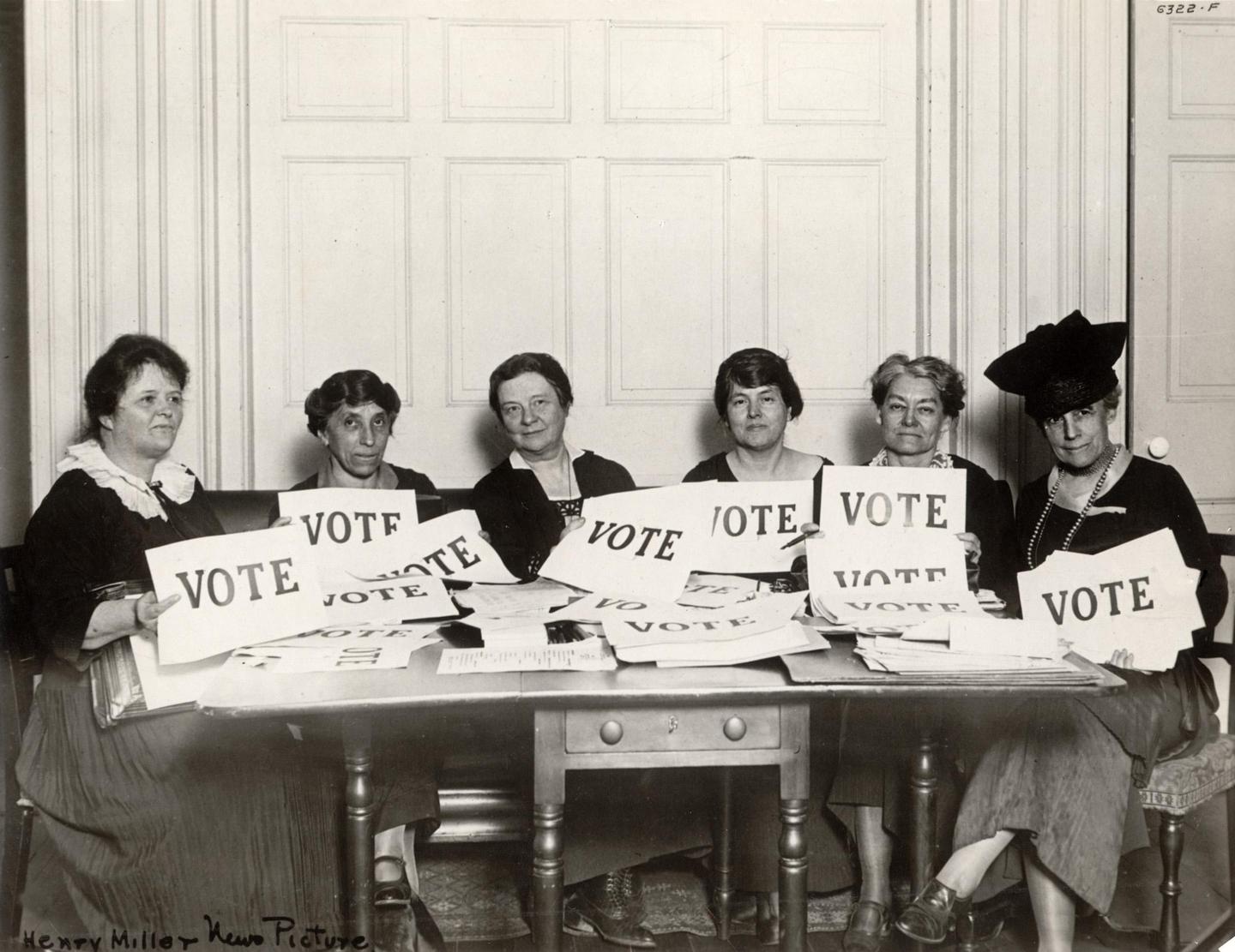 Women hosting a voting booth for other women. Credits: Henry Miller