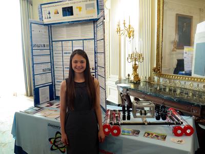 This picture shows that she is standing next to her bigger model that ...