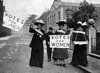A group of suffragettes protest for votes for women