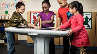 The SMART Table had groups of students around it to work together to ...