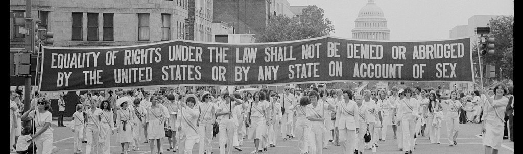 This is a photo of women protesting for equal rights. Protest were big ...