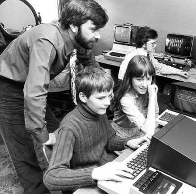 Students using desktop computers in the 1980s