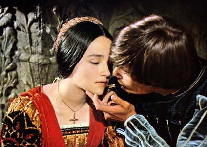 Romeo kisses Juliet. For the first time.