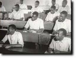 Picture of Tutsi men attending classes, taken before Belgians shifted ...