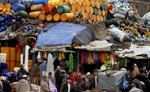Parvana’s father sells items and his reading skills at the Kabul market ...