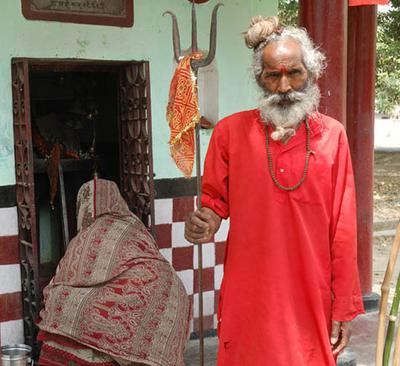 This Brahmin man serves as a village priest. He has spiritual authority ...