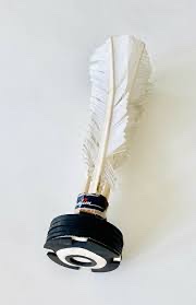 Original Badminton birdies were invented with feathers attached to a ...