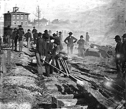 Sherman's men destroying railroad in Atlanta, Georgia. Photo by George ...