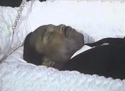 Martin Luther King Jr. laying peacefully in his coffin, nothing but a ...