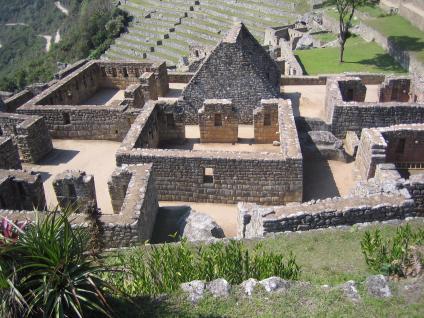 This is a image of a Incan temple. Today, it is a ruin and a place ...