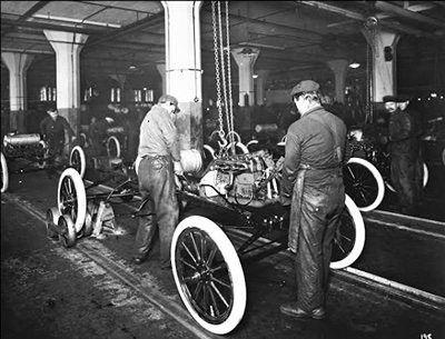 Ford’s moving assembly line allowed cars to be produced faster and ...