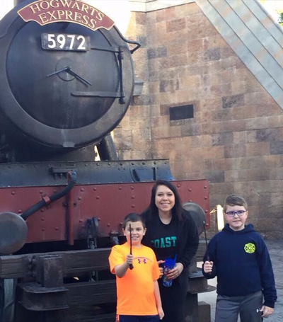 My little brother, his friend Cayden, and I in front of the Hogwarts ...