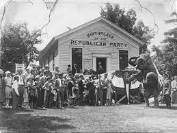 People standing outside of a republican party building