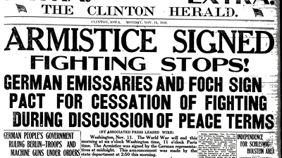A newspaper announcing Germany's signing of the Armistice, and what is ...
