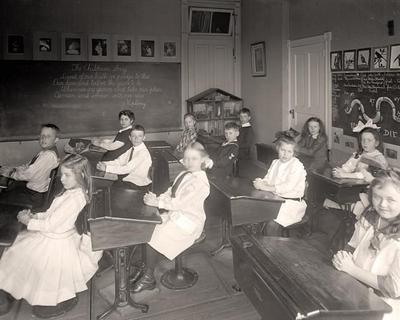 Classroom of young students during war