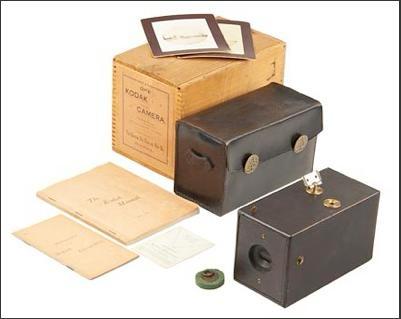 An original Kodak camera, complete with box, camera, case, felt lens ...