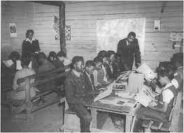 Female teacher monitored by a male administrator.