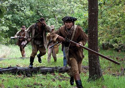 Morgan and his men running in the woods with their long rifles from the ...