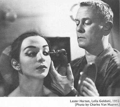 Lester Horton putting make-up on dancer Lelia Goldoni in 1952.