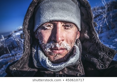 He was chewing tabacco and it's freezing across his face.