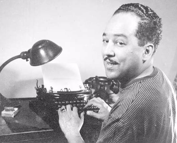 Langston Hughes at a typewriter