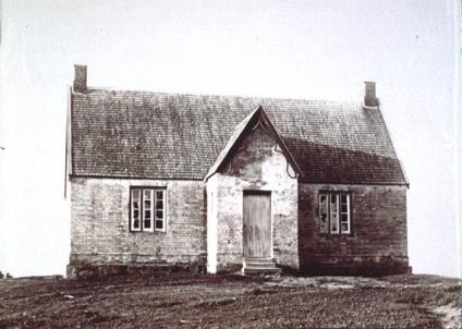 A photograph of the first catholic school.