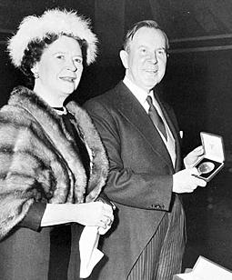 Lester Pearson displaying the Nobel Peace Prize.