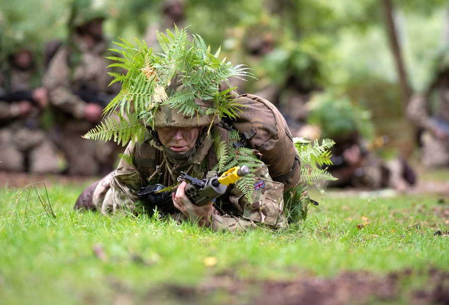 A photo of a cadet participating in cadet Camouflage Training, 2017 ...