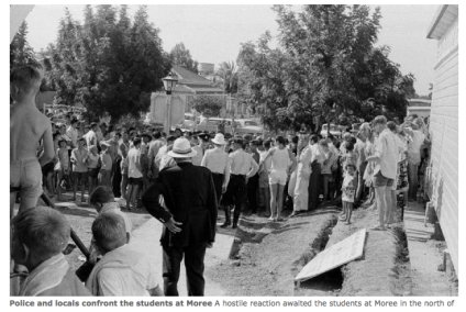 Police and locals confront the students at Moree. The pool became a ...