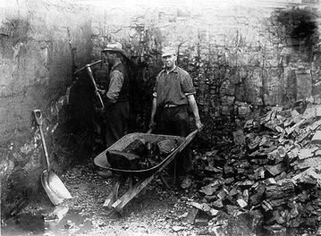 This picture is from the 1800s showing two men mining coal which was ...