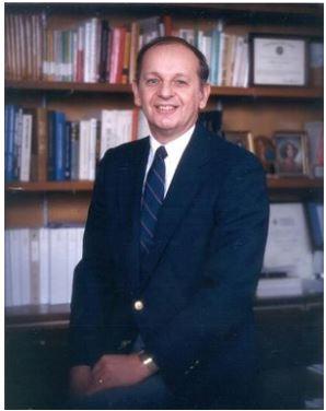 George loved to read and you can see him standing in front of one of ...