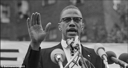 Malcolm X giving a speech at the Audubon ballroom, where he would be ...