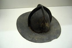 Around 1740, Jacob Turck is credited with creating the first "fire cap".