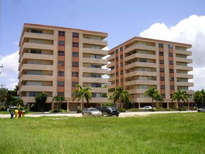 Grace and James' families get invited to Sunset Towers.