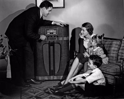 1920s Family Gathered Around a Radio