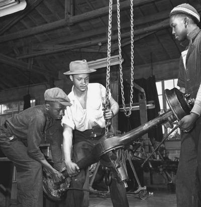 Three mechanics working for the National Youth Administration