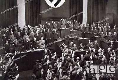 Adolf Hitler making an important speech about the war, and Nazi Germany