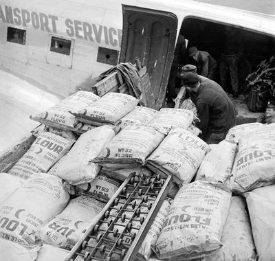 This picture shows the supplies being unloaded.