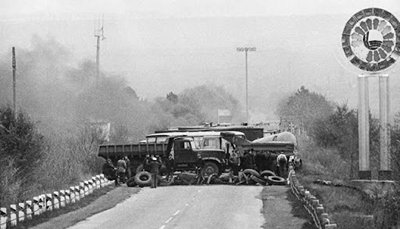 Above is an image of a soviet tank blocking the road of a supply line.
