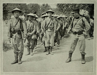 (1914) A French commander and Local soldiers