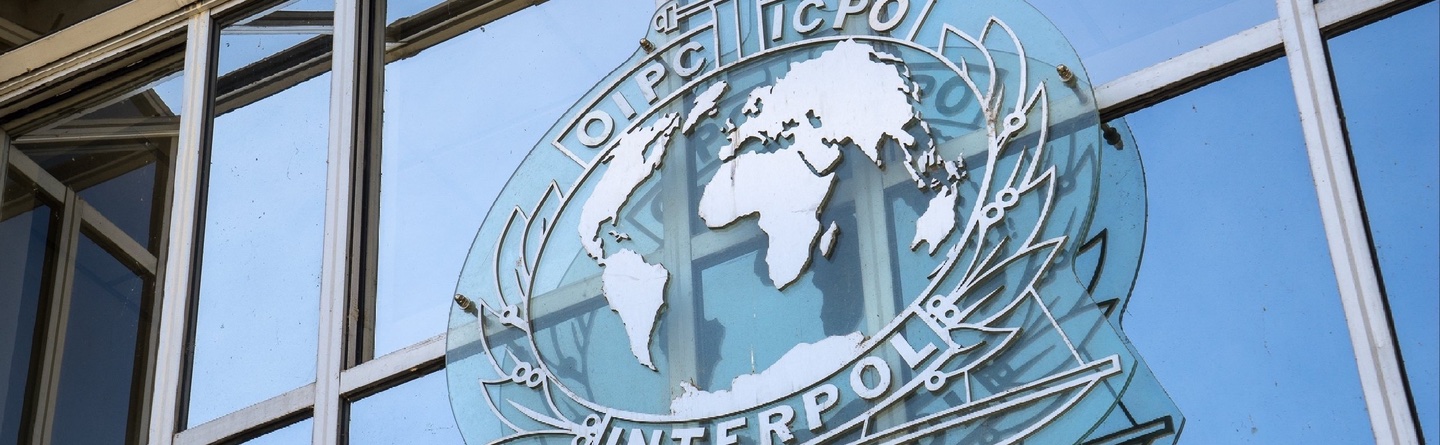 Sign of Interpol's Headquarters in Lyon, France.