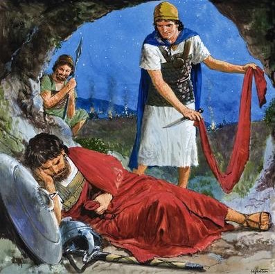 David and Saul in a cave where David spared Saul's life.