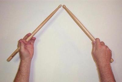 the snare drum is usually played with drum sticks