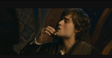 Romeo takes the poison next to the "dead" body of Juliet.