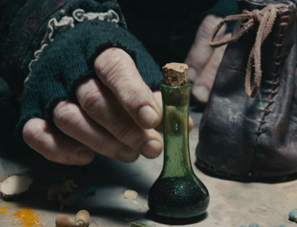 Romeo buys a deadly poison from a poor apothecary in Mantua, which he ...