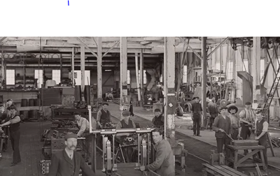 Workers making materials from more advanced simple machines.